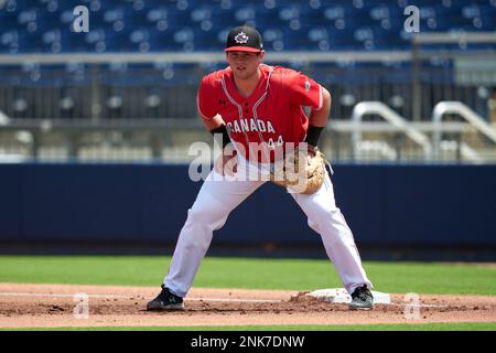 Team Canada first baseman Ty Doucette (44) hits a single during a MiLB ...