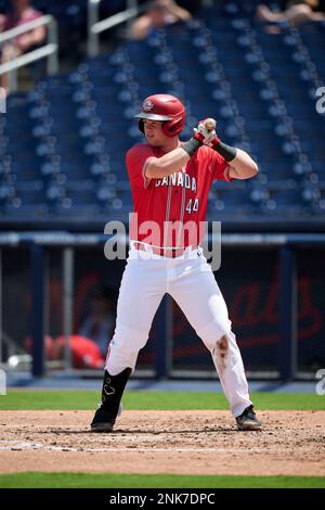 Team Canada first baseman Ty Doucette (44) hits a single during a MiLB ...