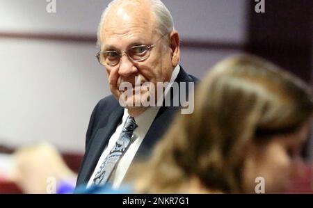 Former Tampa police captain Curtis Reeves points to his left eye while ...