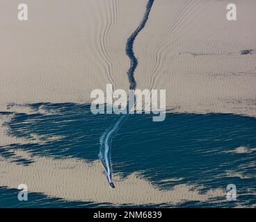 An aerial photo shows a large volume of volcanic pumice stones floating ...