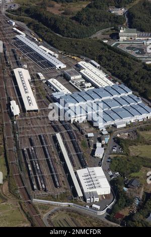 An aerial photo shows a Keisei Electric Railway train car stopped by a ...