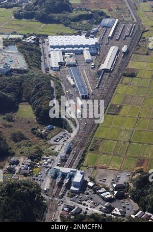An aerial photo shows a Keisei Electric Railway train car stopped by a ...
