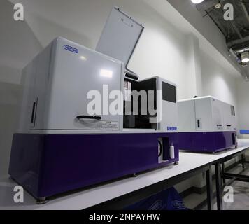A gene analyzar GENECUBE is pictured at Narita International Airport ...