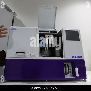 A gene analyzar GENECUBE is pictured at Narita International Airport ...