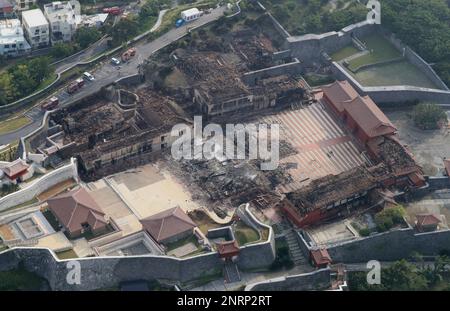 An aerial photo shows charred remains of Shurijo Castle, after it ...