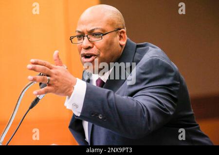 Fulton County Chief Assistant District Attorney Clint Rucker, left ...