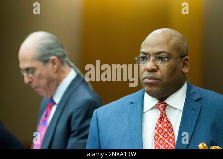 Defense attorney Bruce Harvey, left, speaks with defense attorney Don ...