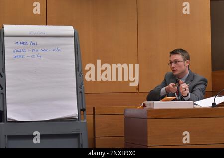 Zachary Weitzel, a GBI firearms examiner responsible for the forensic ...