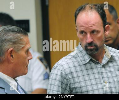 Suffolk County Assistant District Attorney Janet Albertson, center ...