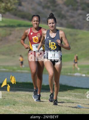 Mikayla Florez of Long Beach State (12) defeats Abbey Meck of ...