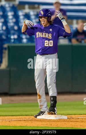 LSU infielder Conner Hale (20) chases a grounder single by Houston's ...
