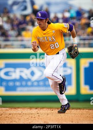 LSU infielder Conner Hale (20) chases a grounder single by Houston's ...