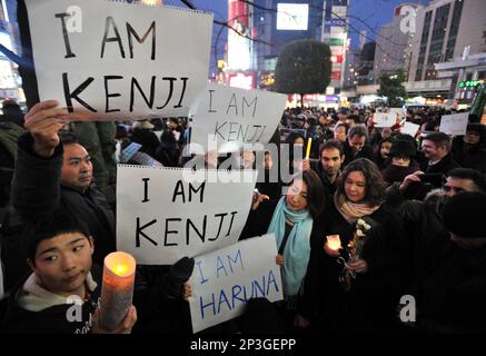 Participants gather to offer prayers for Japanese hostage victims ...