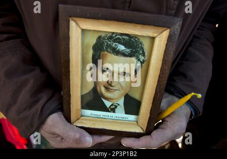 Communism nostalgics gather around the grave of Romanian communist ...