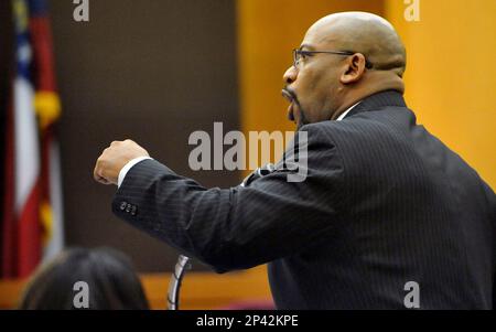 Fulton County Senior Assistant District Attorney Clint Rucker, right ...