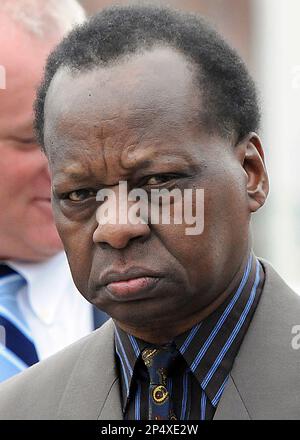 Onyango Obama, the uncle of President Barack Obama, right, stands with ...