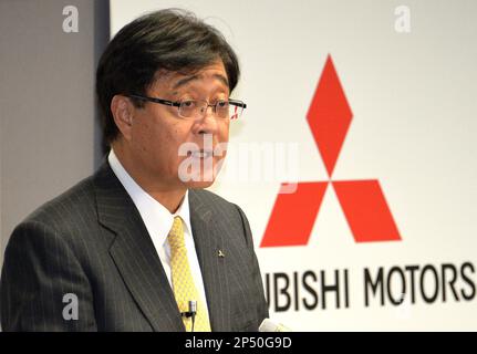 Osamu Masuko, President of Mistubishi Motor Corp. poses with a ...
