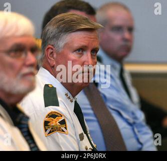 Nicholas Lindsey, 16, center, accused of killing St. Petersburg Police ...