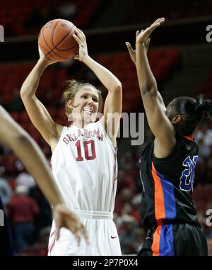 Oklahoma forward Carlee Roethlisberger, left, greets teammate Whitney ...