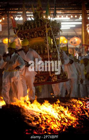 Malaysian Chinese carrying an Emperor God leaving a temple during a ...
