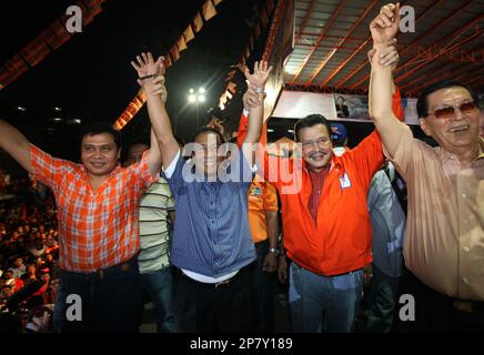 Ousted former Philippine President Joseph Estrada, center, arrives ...