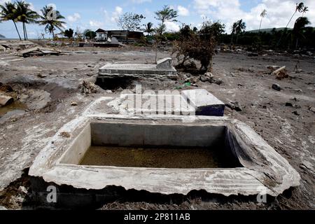 The cement top of a grave is dislodged and the body is missing at ...