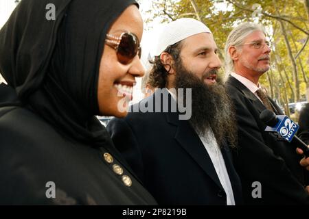 Fatima Afzali, left, wife of Imam Ahmad Afzali, who pleaded guilty to ...