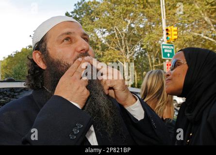 Fatima Afzali, left, wife of Imam Ahmad Afzali, who pleaded guilty to ...