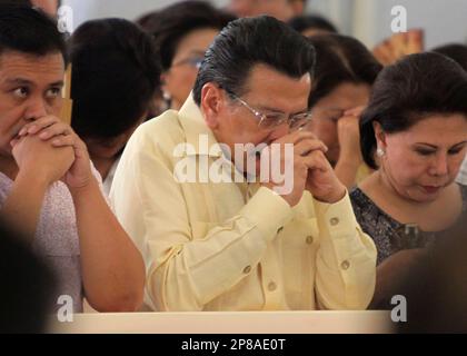 Philippine Senator Jinggoy Estrada, center, the son and co-accused of ...