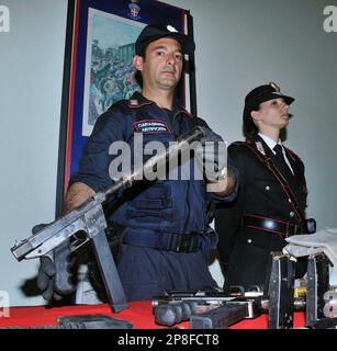 Italian Carabinieri police officers show their tactical set-up during a ...
