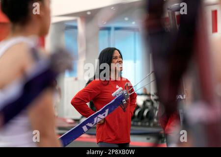 Rutgers women’s gymnastics coach Umme Salim-Beasley watches as student ...