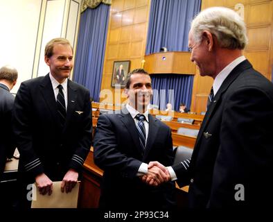 Air Traffic Control Specialist Patrick Harten, right, is all smiles as ...