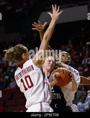 Oklahoma forward Carlee Roethlisberger, left, greets teammate Whitney ...