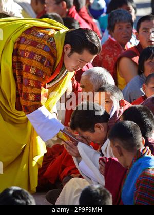 Bhutan's 5th King Jigme Khesar Namgyal Wangchuk, center, walks in the ...