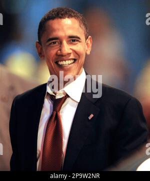 Democratic presidential candidate Sen. Barack Obama, D-Ill., laughs ...