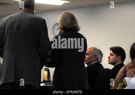 Neil Entwistle, far right, listens to a conference between Judge Diane ...