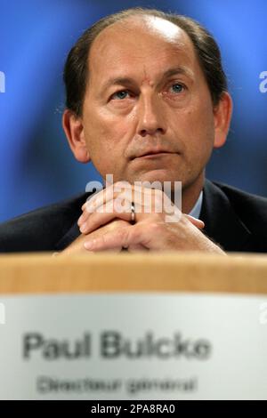 Paul Bulcke, front, designated CEO of Nestle, listens to Nestle's ...