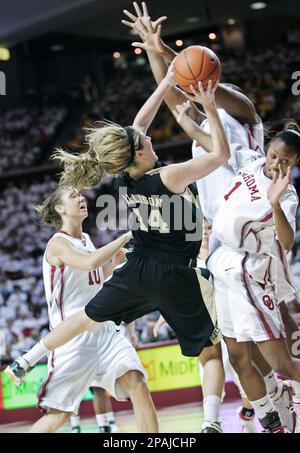 Oklahoma forward Carlee Roethlisberger, left, greets teammate Whitney ...