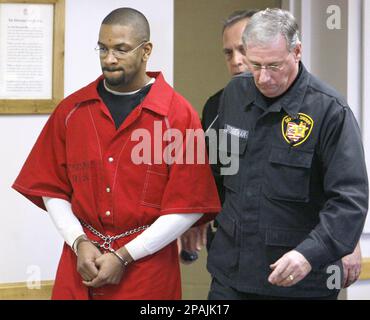 Former Canton police officer Bobby L. Cutts reacts while being ...