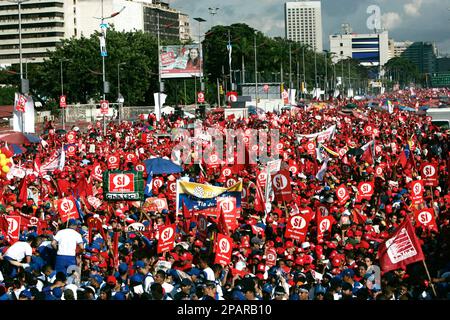 Supporters Venezuela's President Hugo Chavez arrive for a rally in ...
