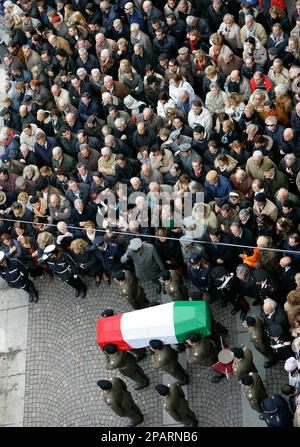 An Italian flag wraps the coffin of Daniele Paladini, the Italian ...