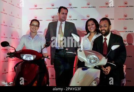 Ultra Motor Managing Director Ganesh Mahalingam poses with Velociti, a ...