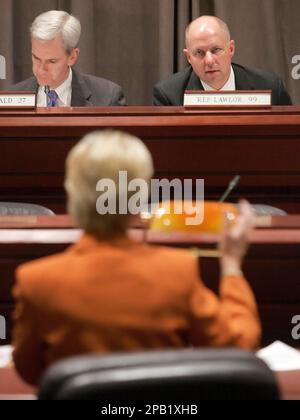 Connecticut state Rep. Michael Lawlor, D-East Haven, left, Rep. Stephen ...