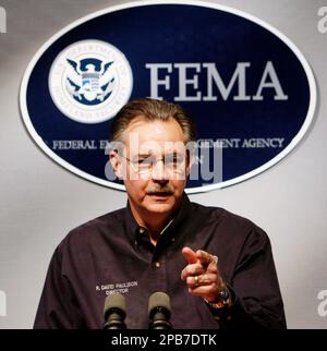 David Paulison, center, FEMA Administrator, and Matt Jadacki, Deputy ...