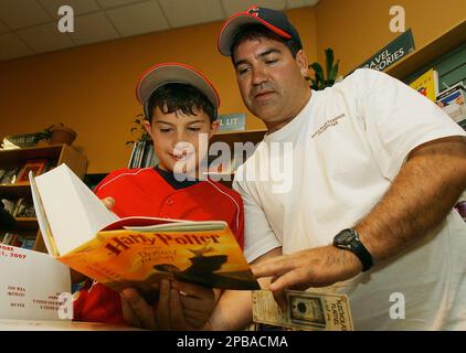 George Liddy, 11, left, and his father Tom Liddy, both of Chandler ...