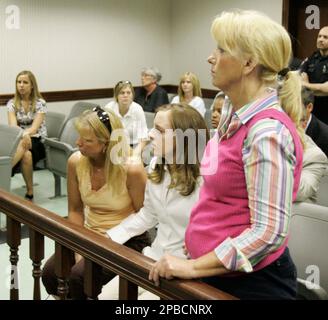 Patricia Porter, mother of Jessie Davis, listens to the judge as he ...