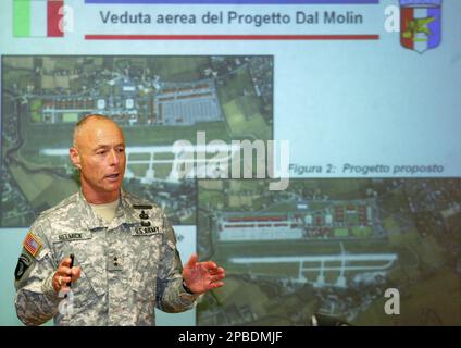 U.S. Army General Frank Helmick gestures at a press conference on the ...