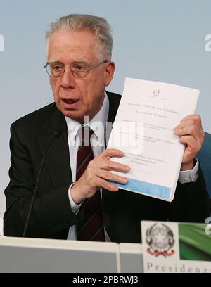 Italian Economy Minister Tommaso Padoa Schioppa, left foreground, at ...