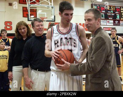Upper Sandusky guard Jon Diebler takes a drink of water on the bench ...