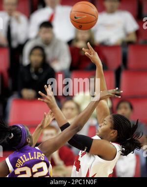 Georgia's Tasha Humphrey, right, puts up a shot over Memphis' Megan ...